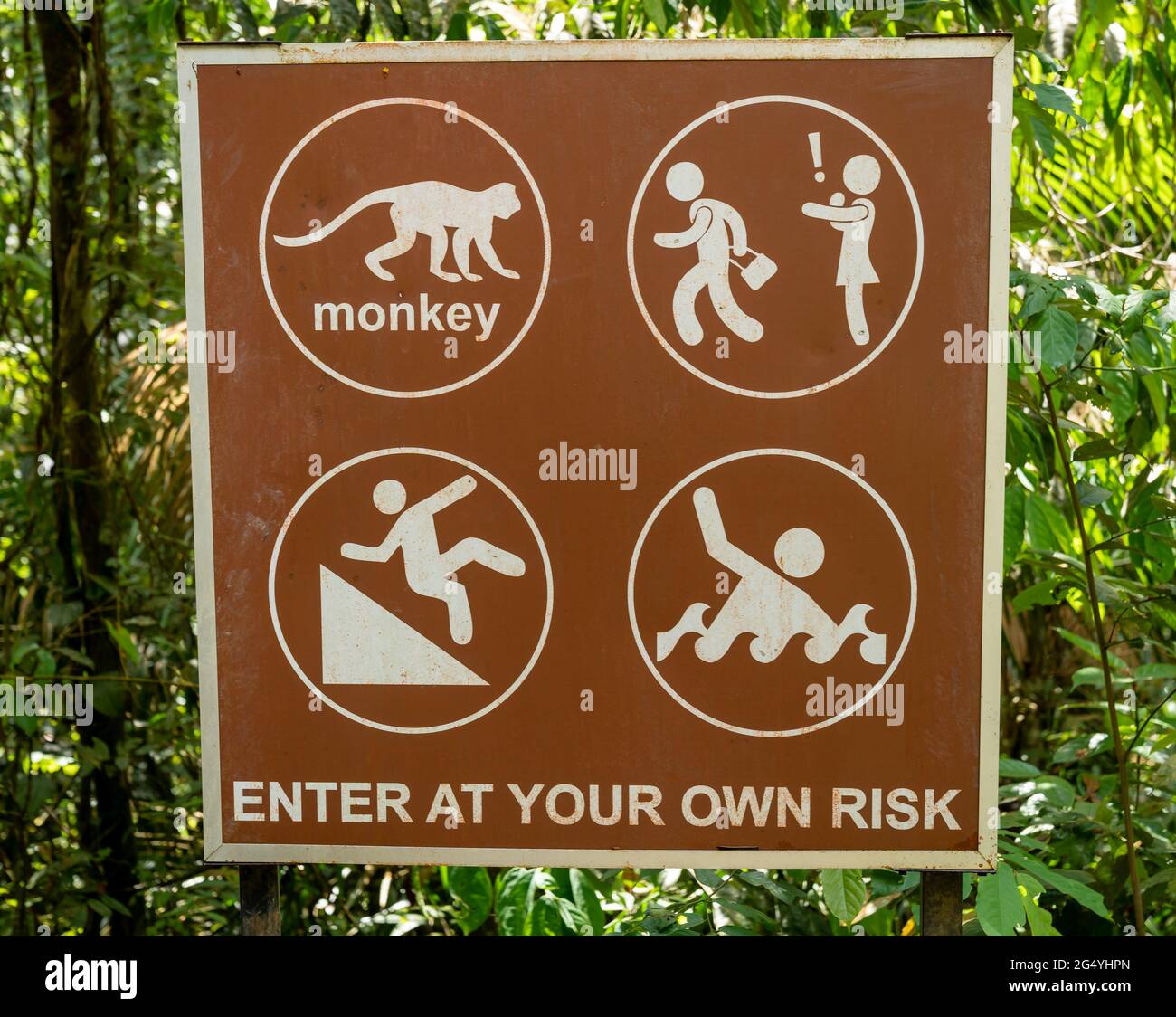 Enter at your own Risk Sign in Malaysia Stock Photo - Alamy