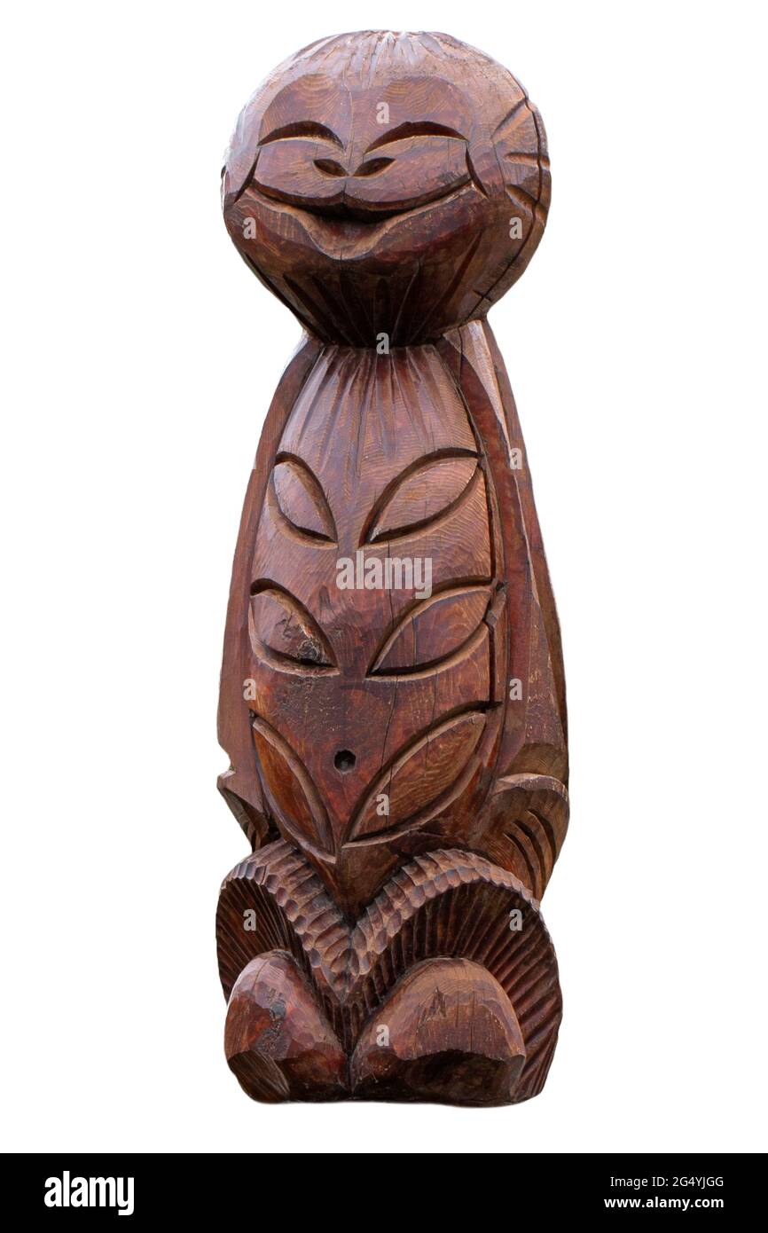 wooden idol statue of koryak on a white background Stock Photo - Alamy
