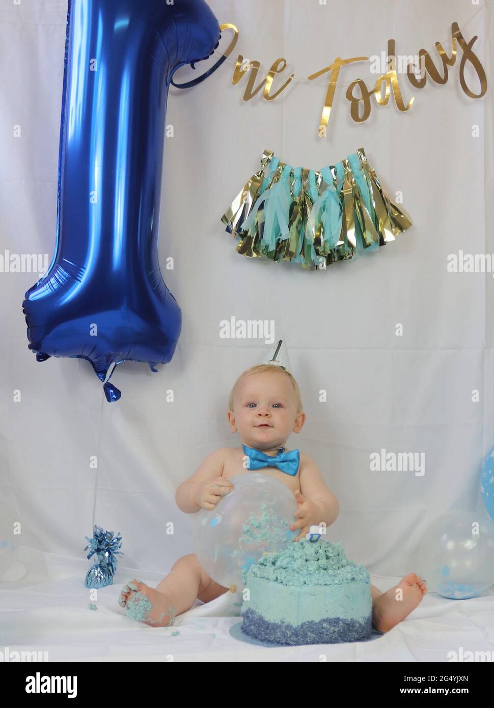 Baby boy first birthday, a cake smash party Stock Photo - Alamy