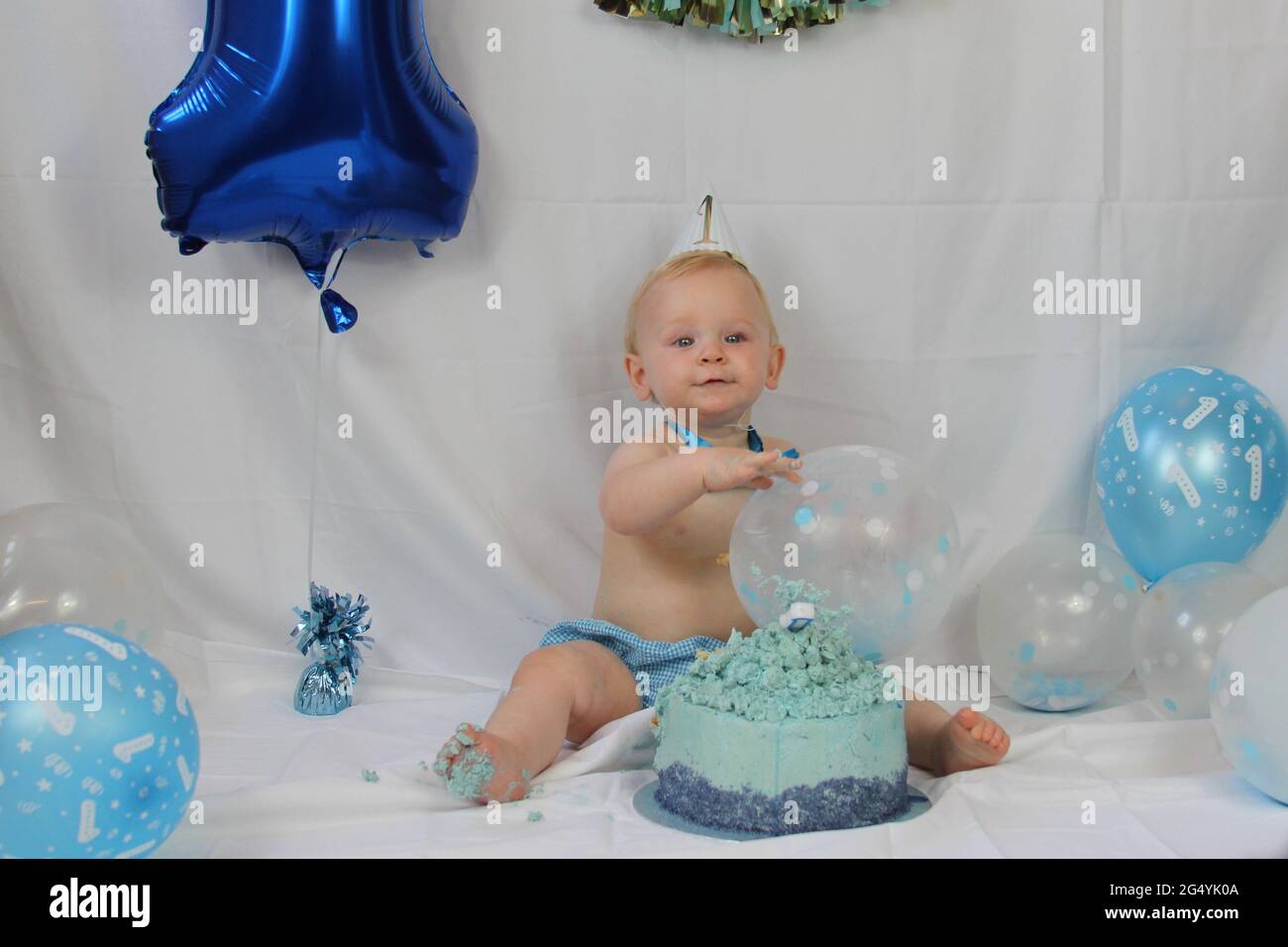 Baby boy first birthday, a cake smash party Stock Photo - Alamy