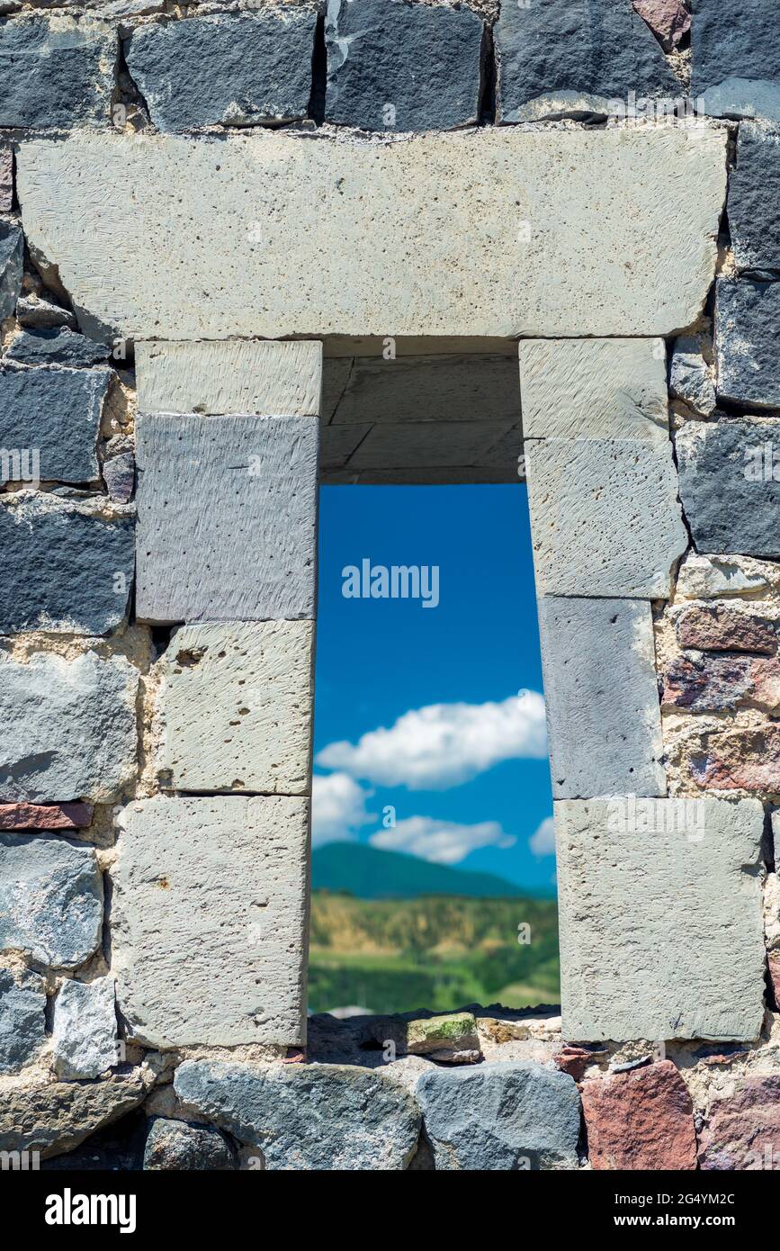 Slit window loophole in the castle wall Stock Photo - Alamy