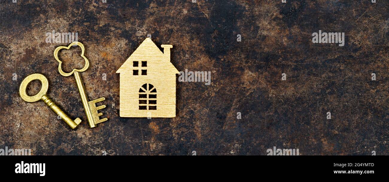 Gold keys and home house shape. Real estate, property investment ...