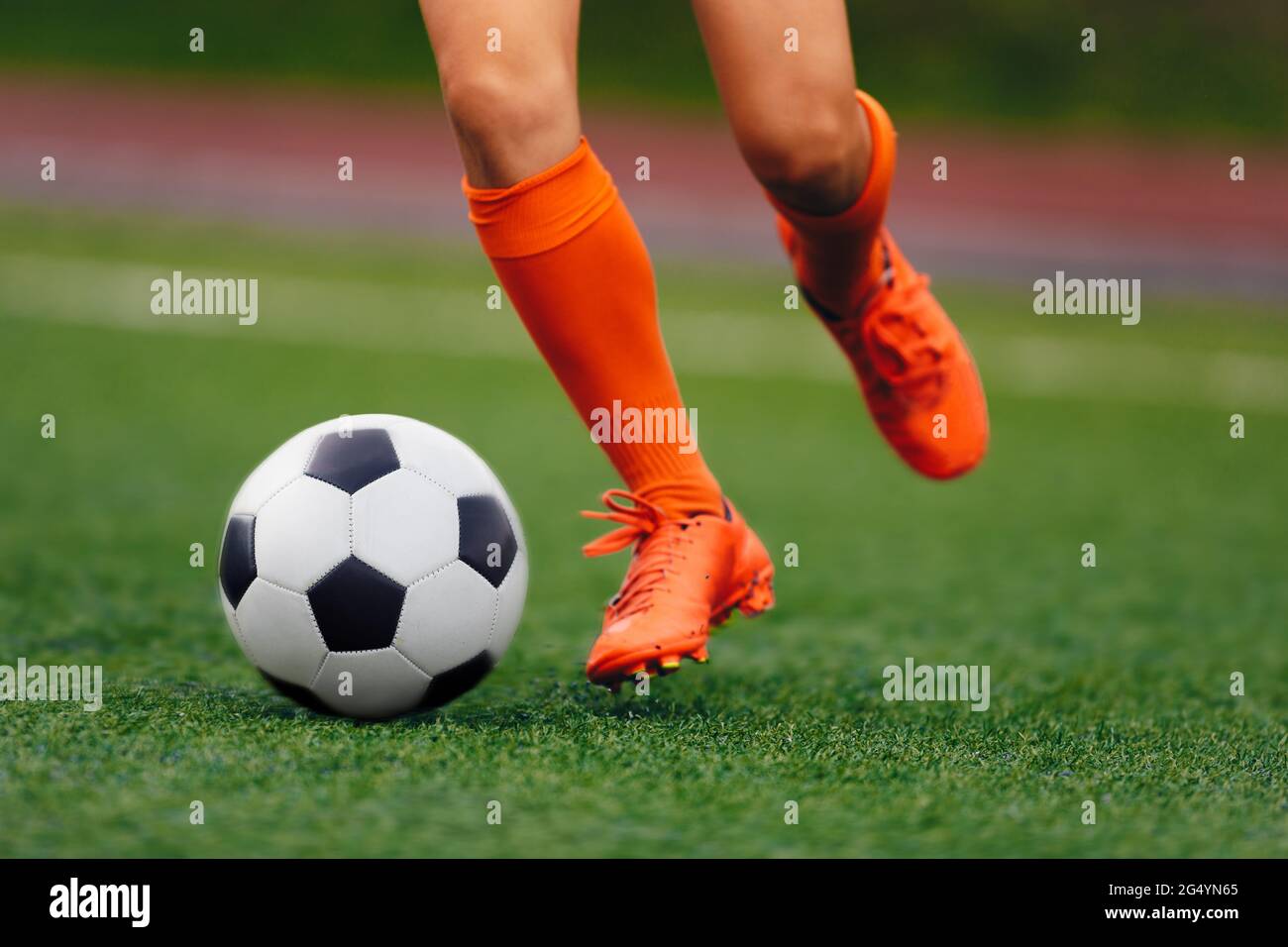 Cleats on turf hi-res stock photography and images - Alamy