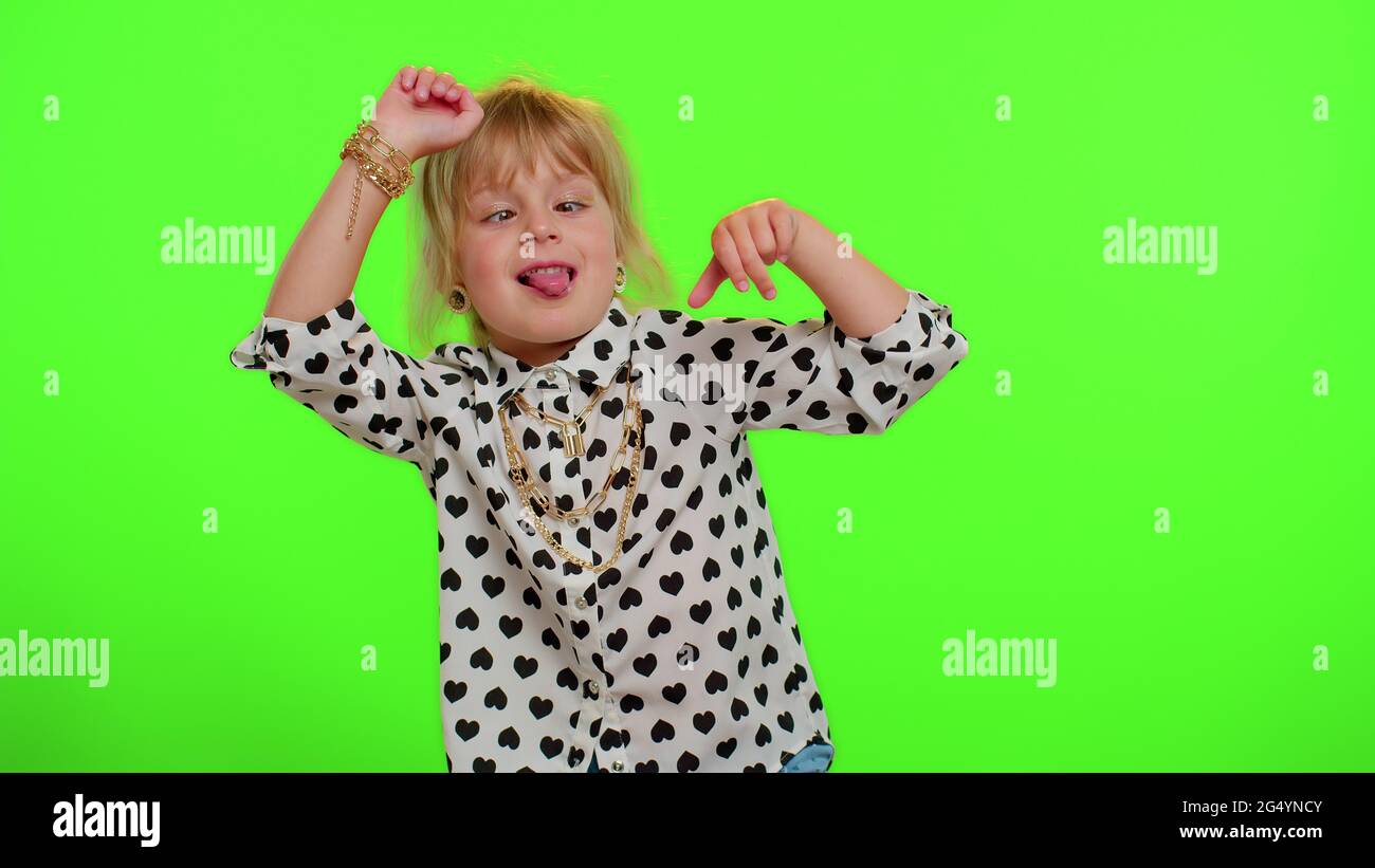 Funny child kid girl making playful silly facial expressions and ...