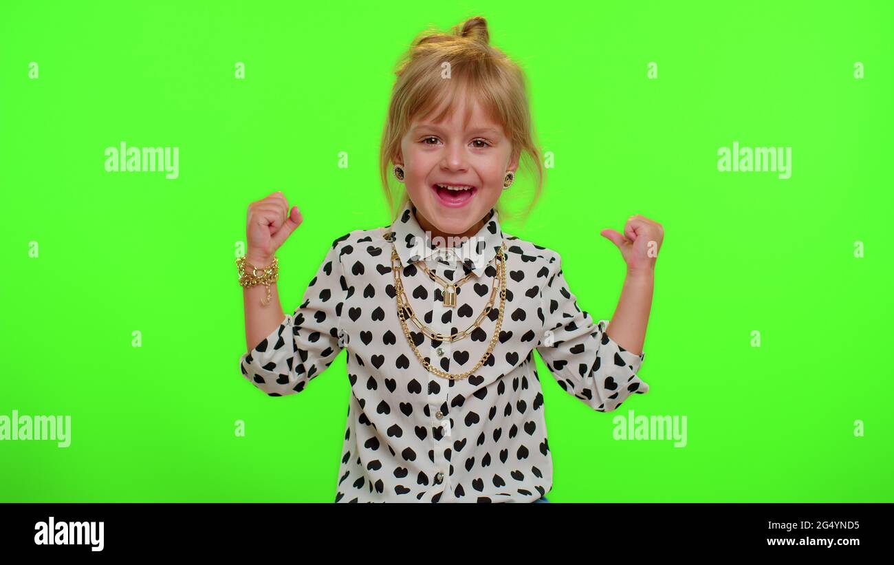 Little blonde kid child girl celebrate success win, rejoices doing ...