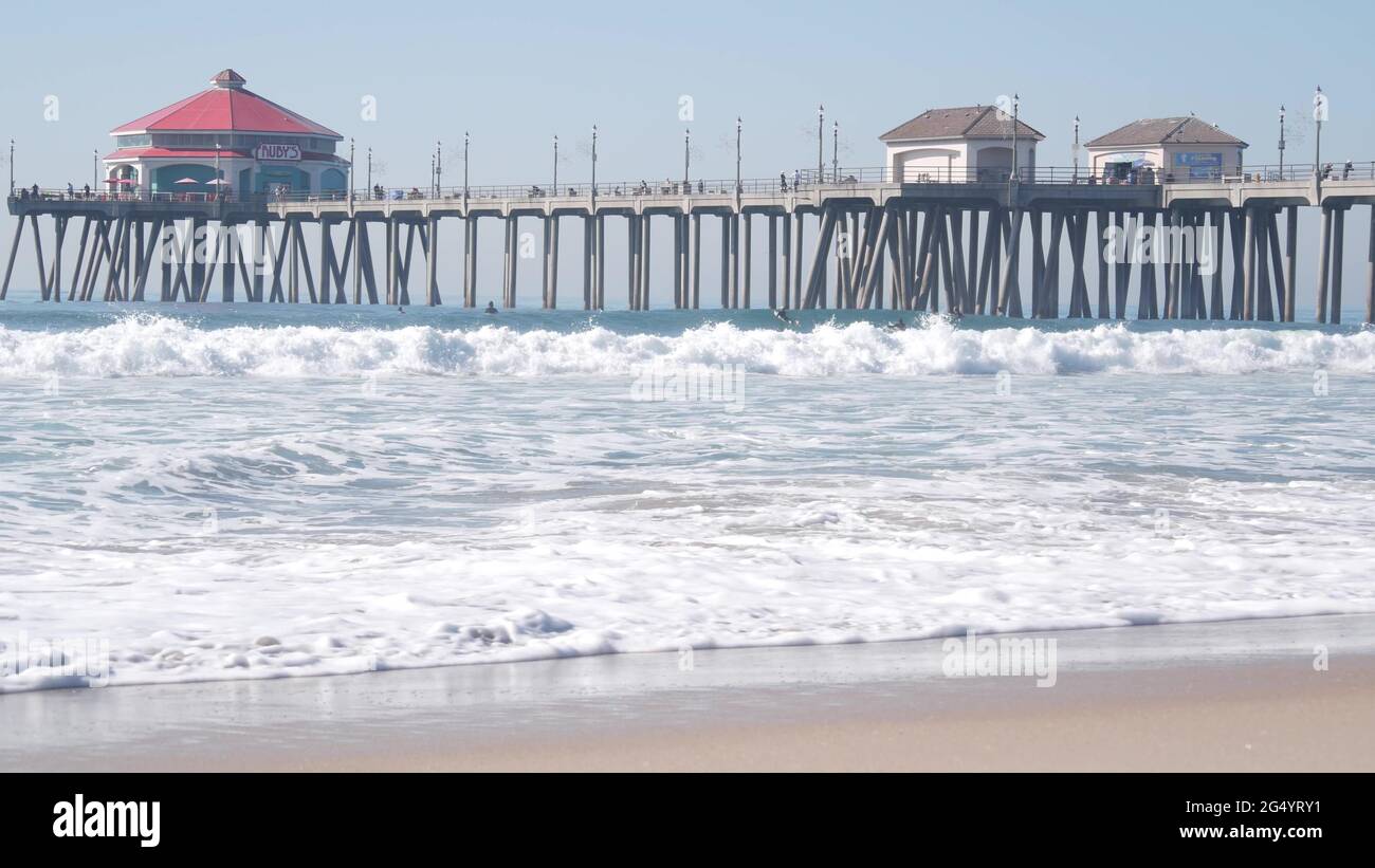 Huntington Beach, California USA - 2 Dec 2020: People surfing in ocean ...
