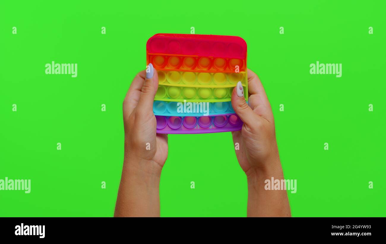 Children play hand button hi-res stock photography and images - Alamy