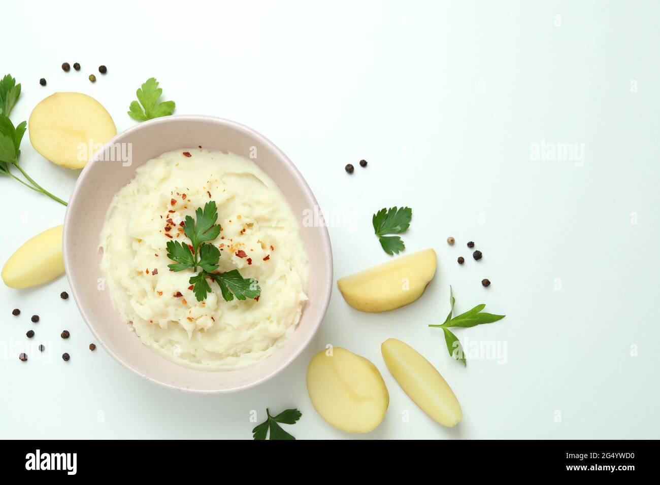 Plate of mashed potatoes and ingredients on white background Stock ...