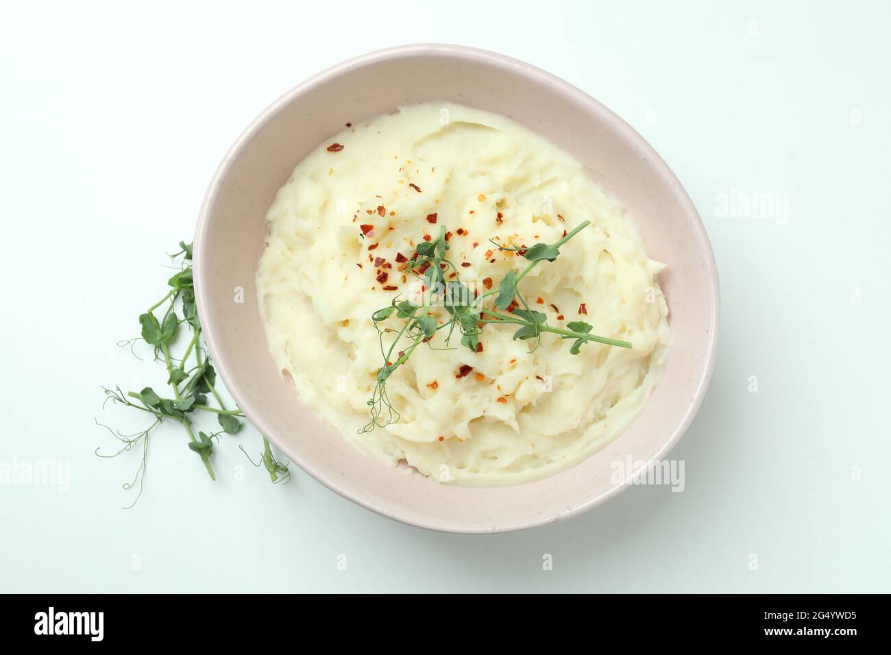 Plate of mashed potatoes on white background Stock Photo - Alamy