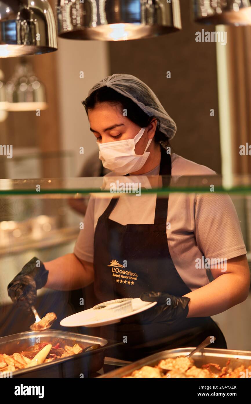 Picking food of platter hi-res stock photography and images - Alamy