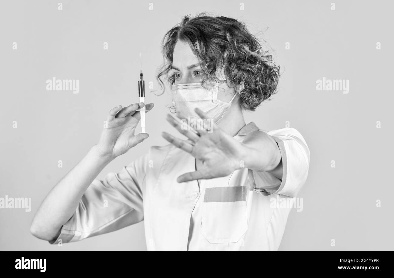 woman nurse with stethoscope. researcher holding flu vaccine. Doctor ...