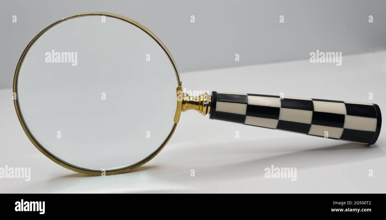 Gold Magnifying Glass Stock Photo - Alamy