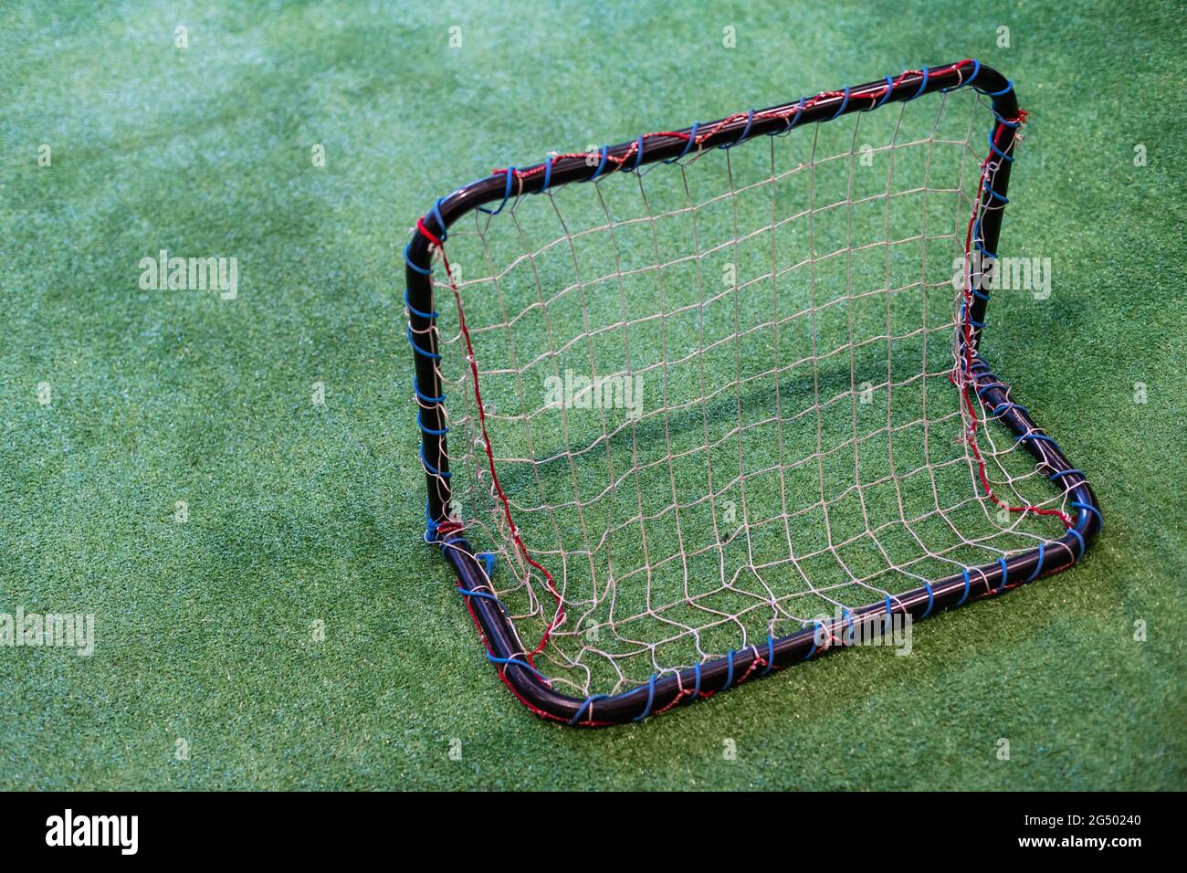 Toy football field and gate, sport background Stock Photo - Alamy