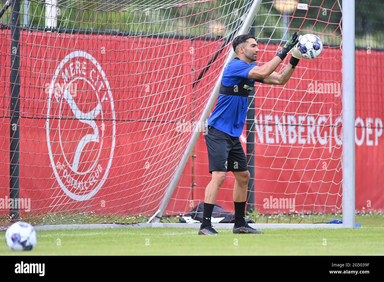 ALMERE, NETHERLANDS - JUNE 24: Goalkeeper Agil Etemadi of Almere City ...