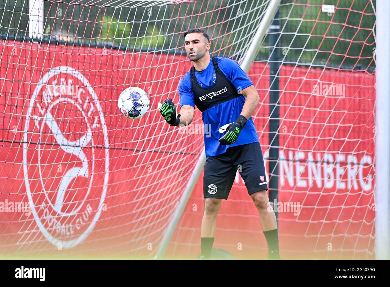 ALMERE, NETHERLANDS - JUNE 24: Goalkeeper Agil Etemadi of Almere City ...