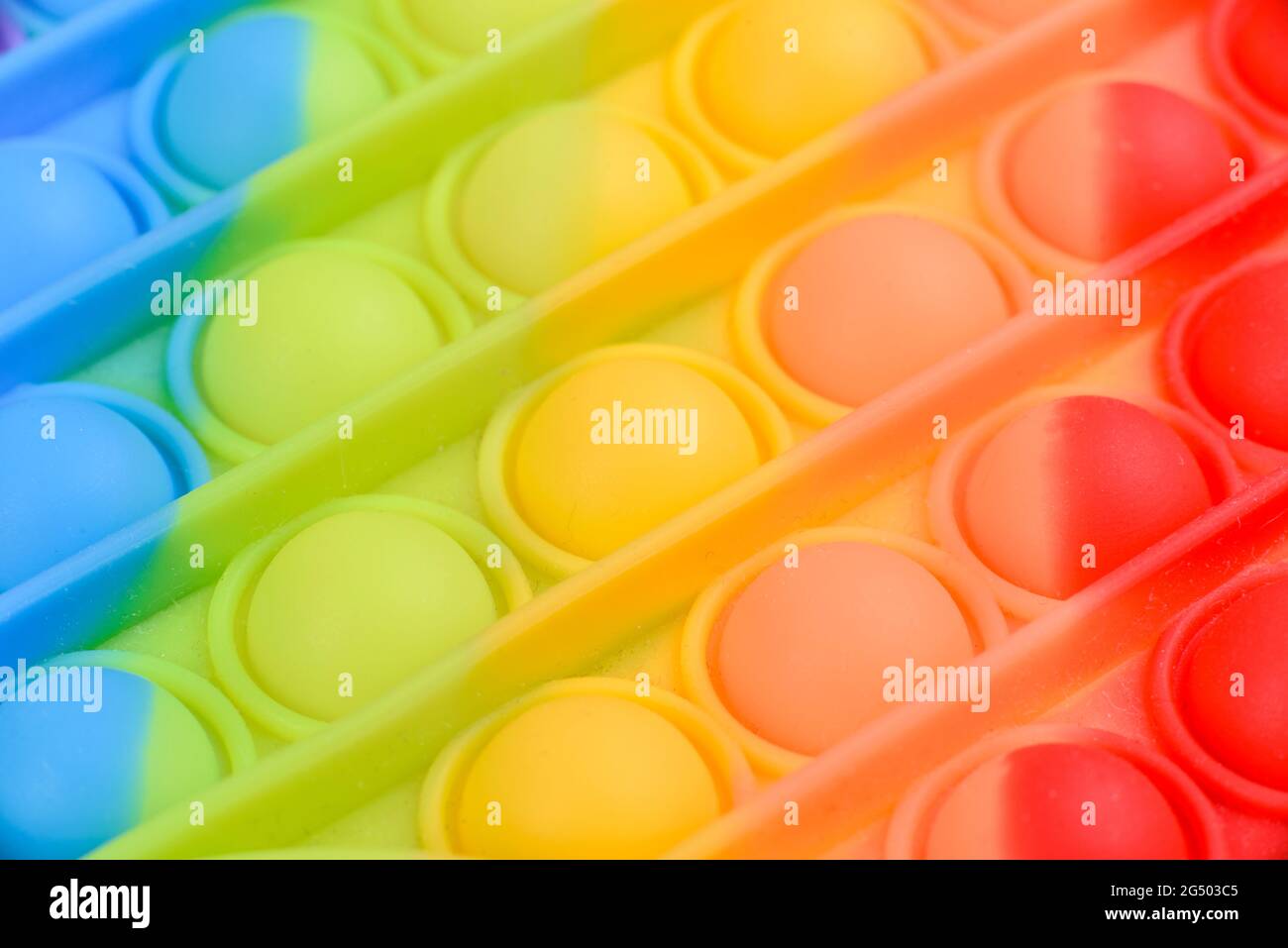 Bright colorful children's toy made of silicone designed to relieve ...