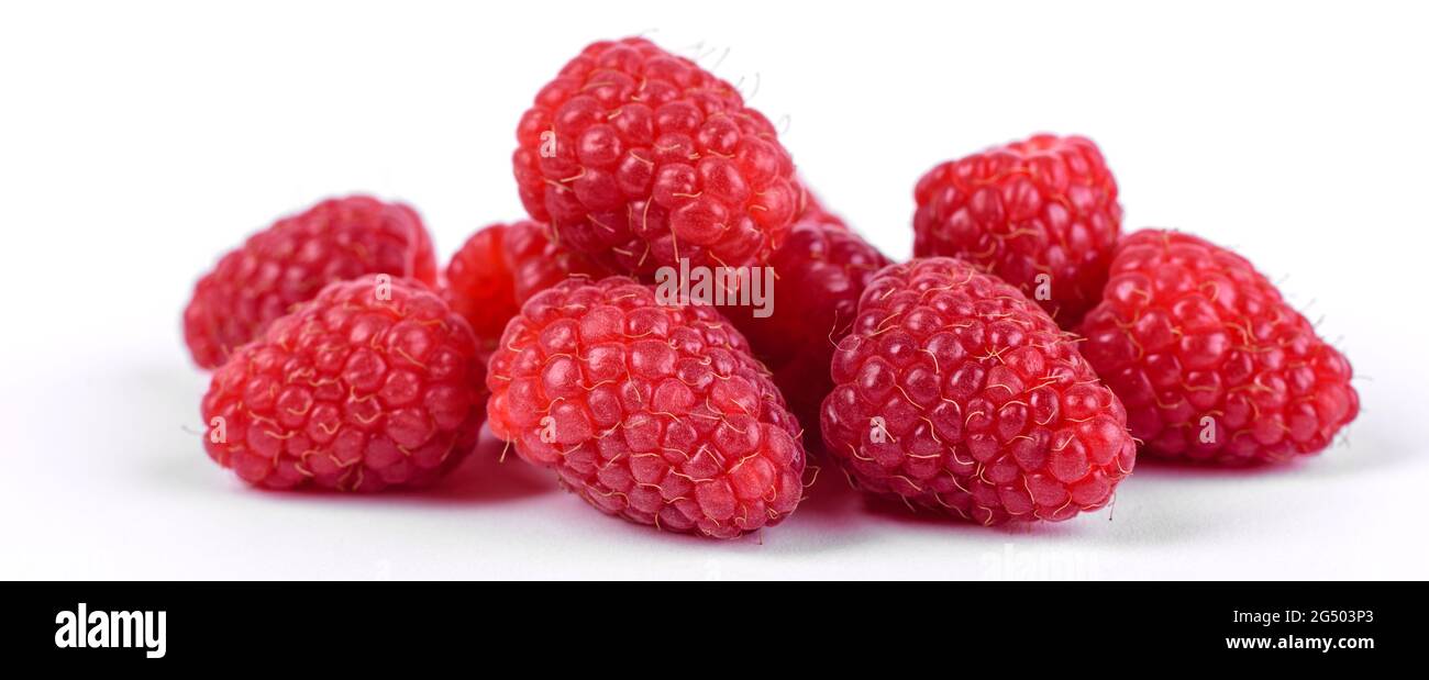 Ripe red raspberries isolated on white background Stock Photo - Alamy