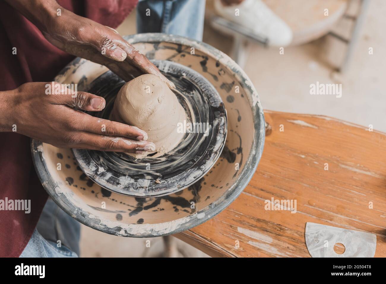 Man modeling with clay hi-res stock photography and images - Alamy