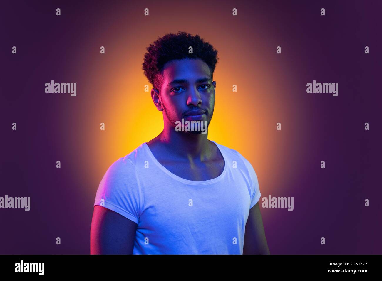 Portrait of a young african man at studio. High Fashion male model in ...