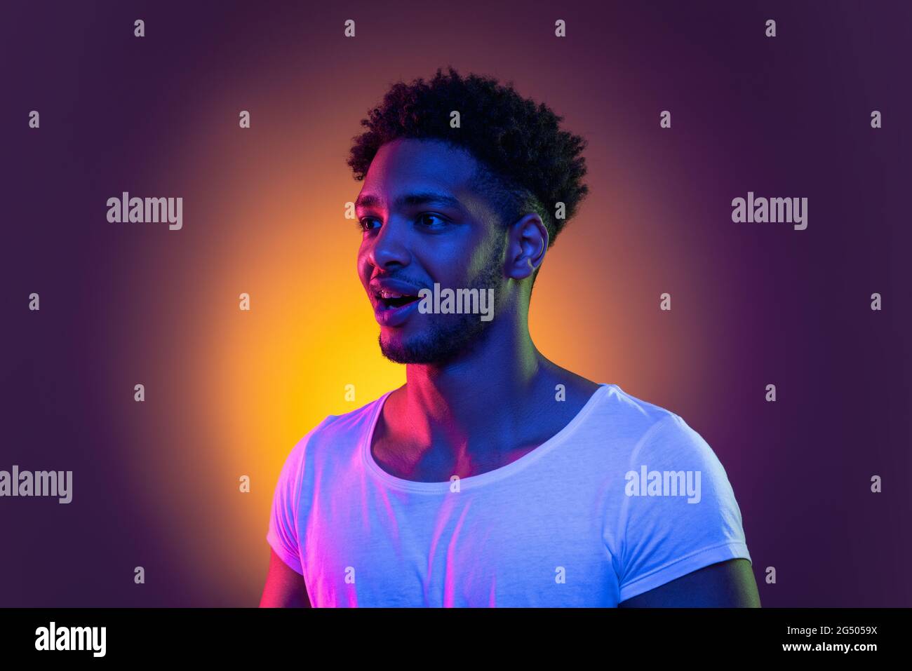 Portrait of a young african man at studio. Fashion male model in ...