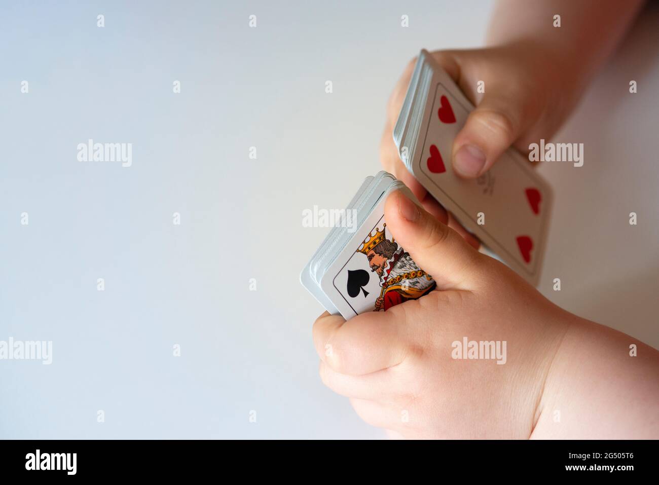 Children Playing Game Cards High Resolution Stock Photography and ...