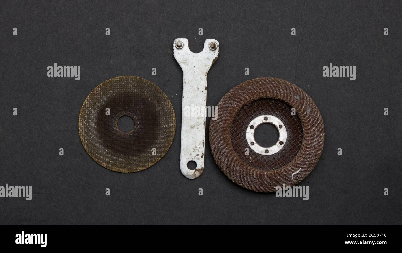 A Close Up of a Cutting Wheel, Flapper Disc and a Grinder Wrench Stock ...