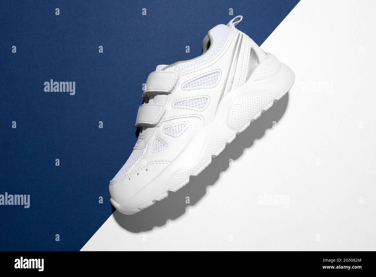 top view macro on the side one white sneaker with Velcro fasteners for ...