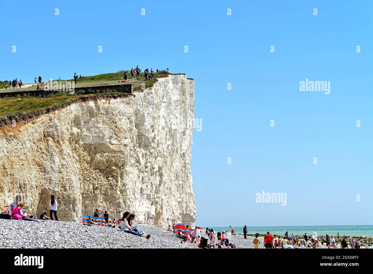 The unstable chalk cliffs at Birling Gap as viewed from the beach on a ...