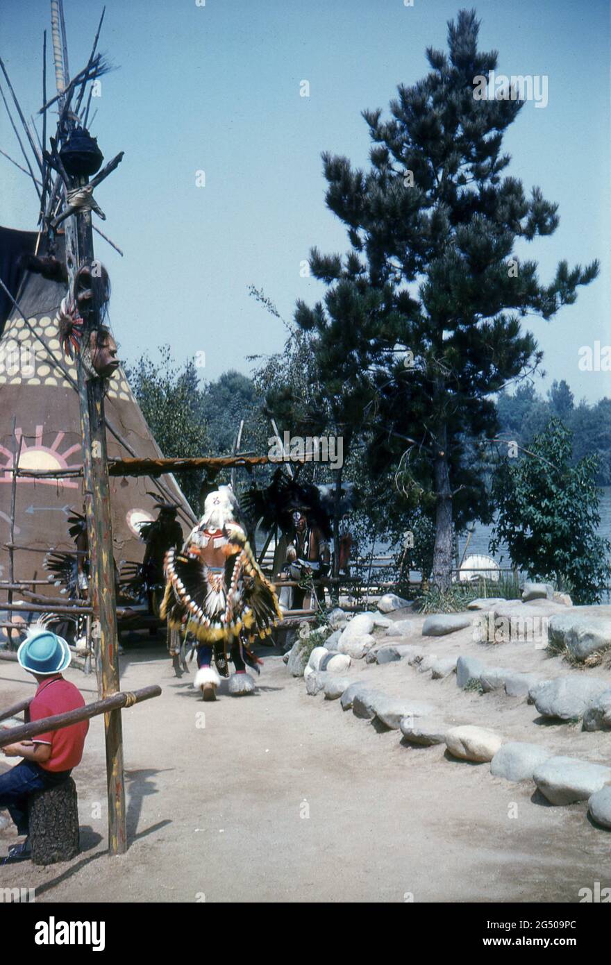 Disneyland, California, 1959. A group of Native American dancers are ...