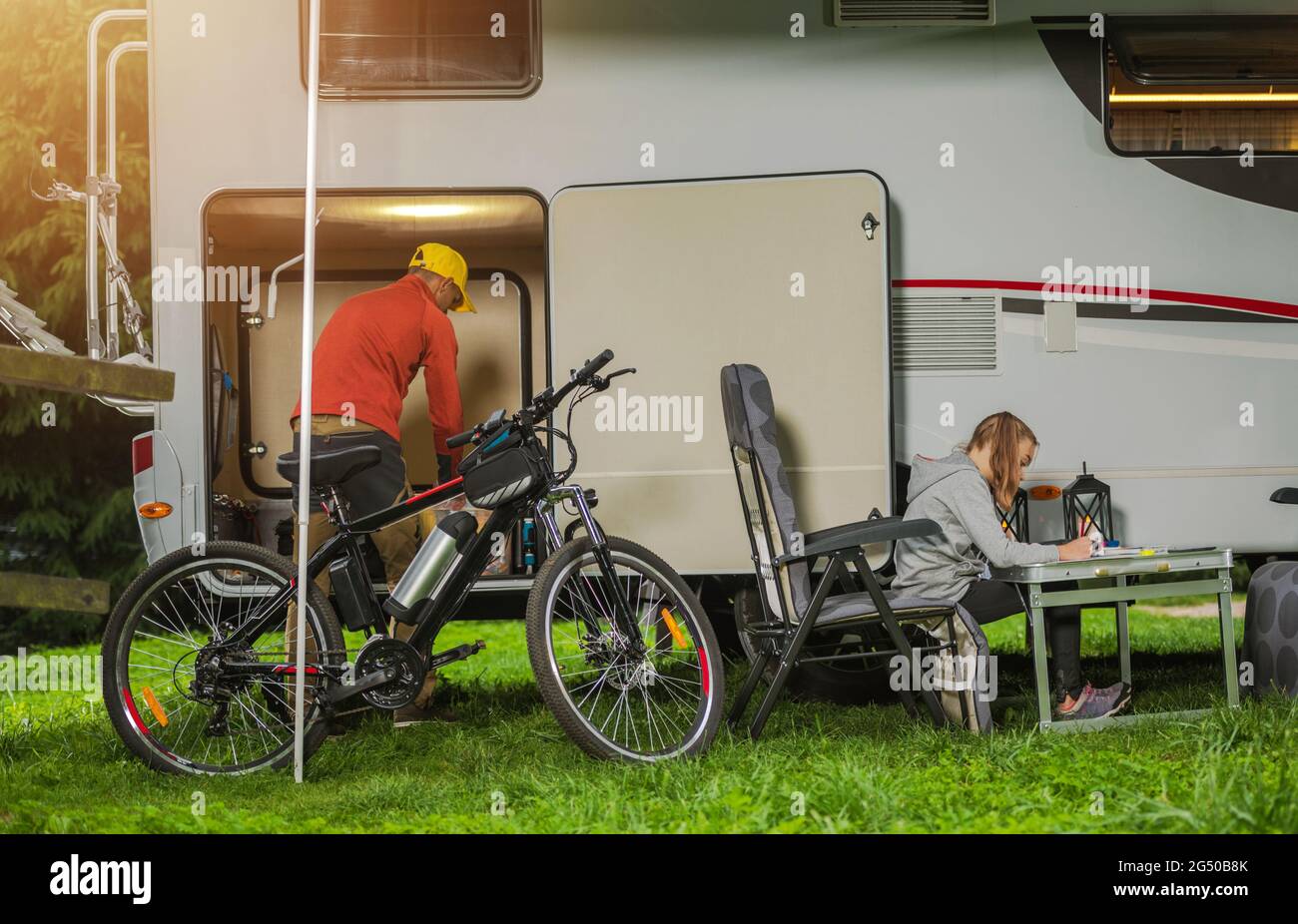 Caucasian Family RV Camping Time. Father and His Daughter In Front of ...