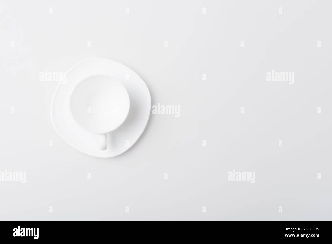 top view of empty cup and saucer isolated on white Stock Photo - Alamy