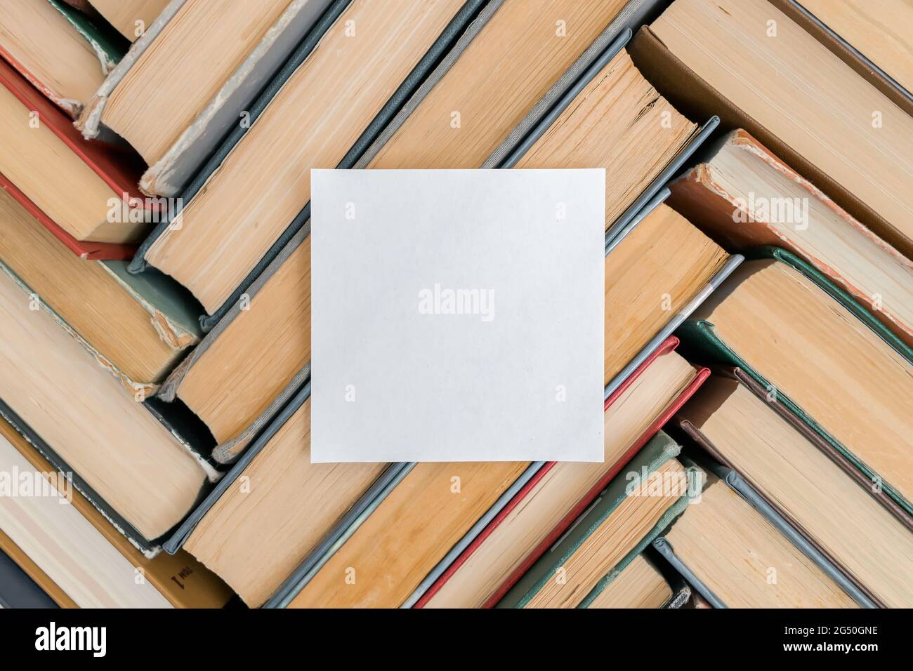 A pattern of old books with a top view. Solid background with copy ...