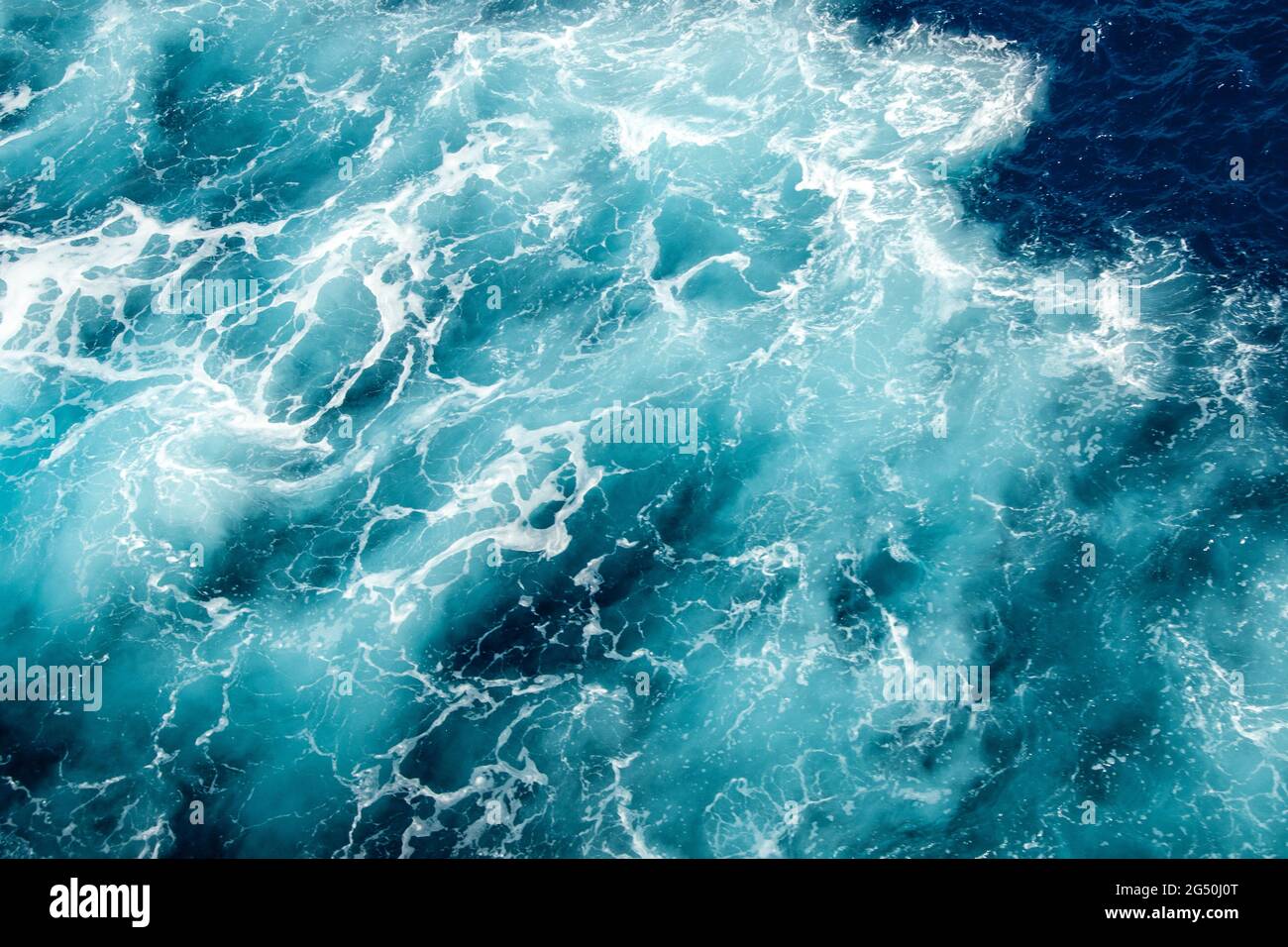 Aquamarine sea foam generated by ship's propeller Stock Photo - Alamy