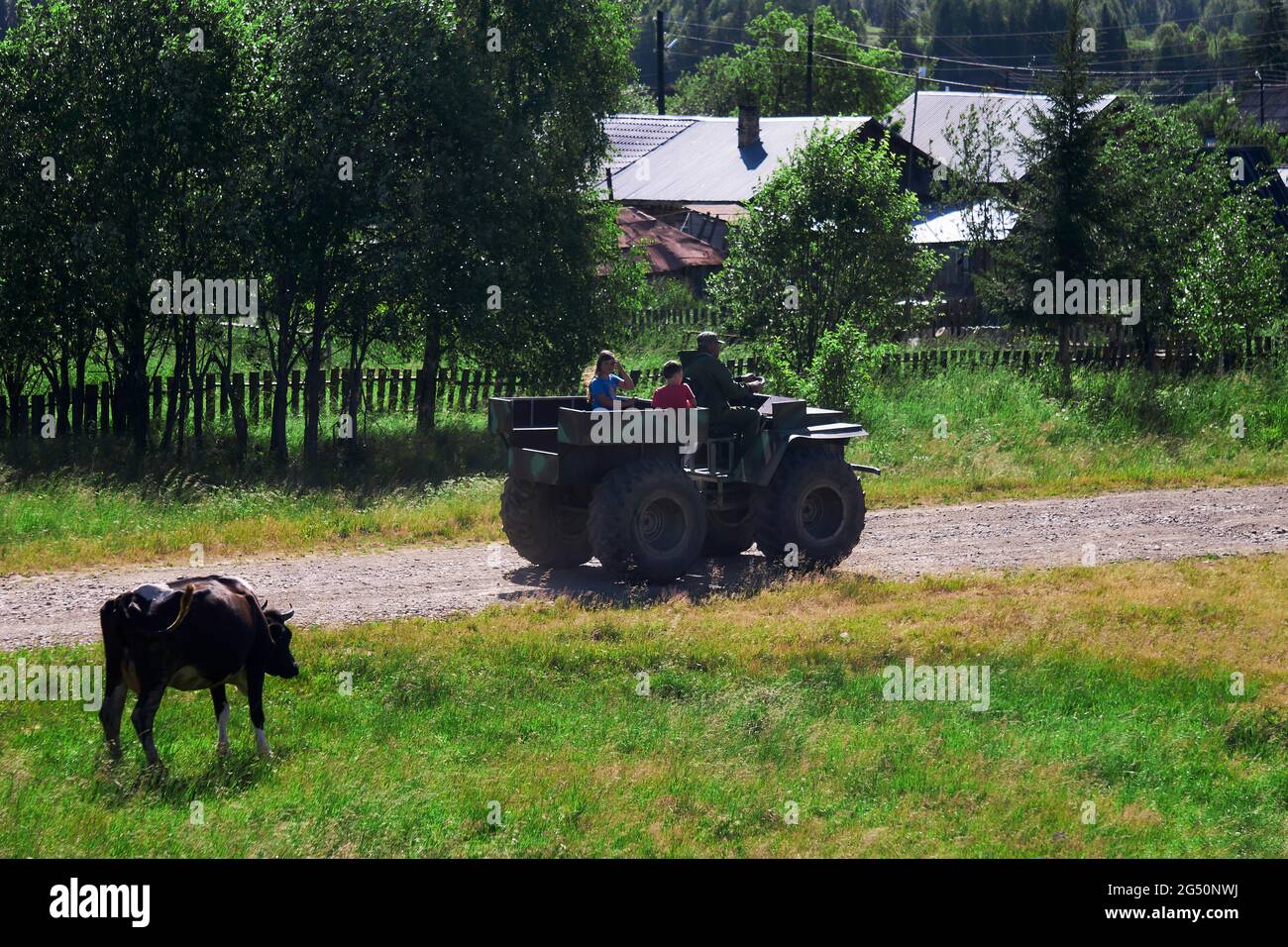 Mys, Russia - June 20, 2021: villagers rides a makeshift swamp buggy ...