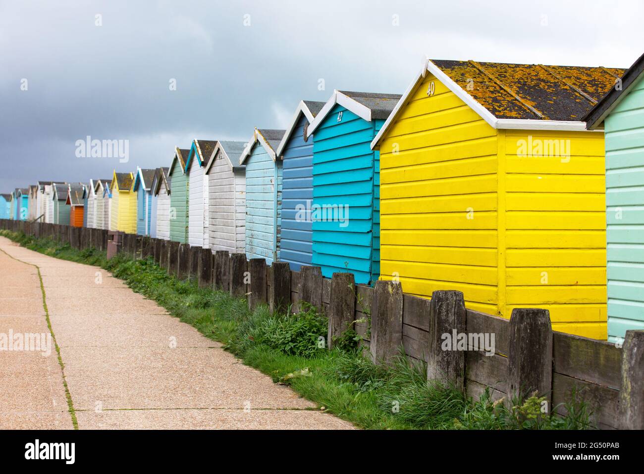 Colorful Beach Huts On England S Coast On A Dyke. Rear View . Dyke Path ...