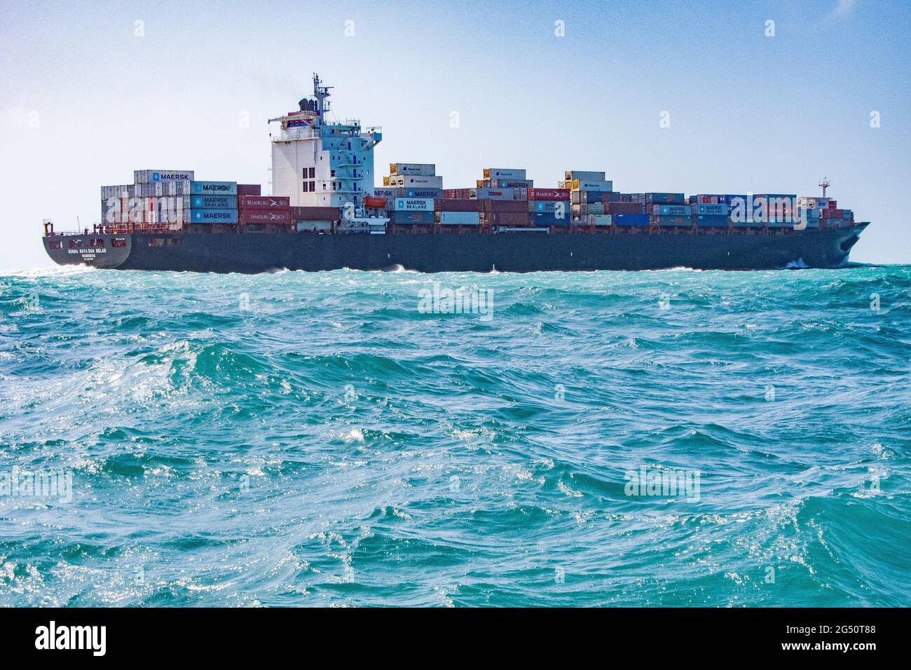 huge container ship sailing on high seas in calm weather Stock Photo ...