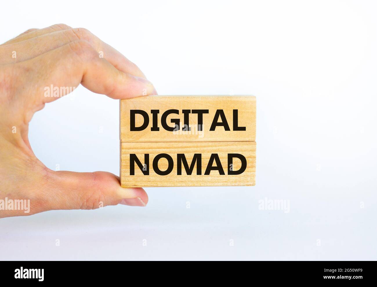 Digital nomad symbol. Wooden blocks with words Digital nomad on ...