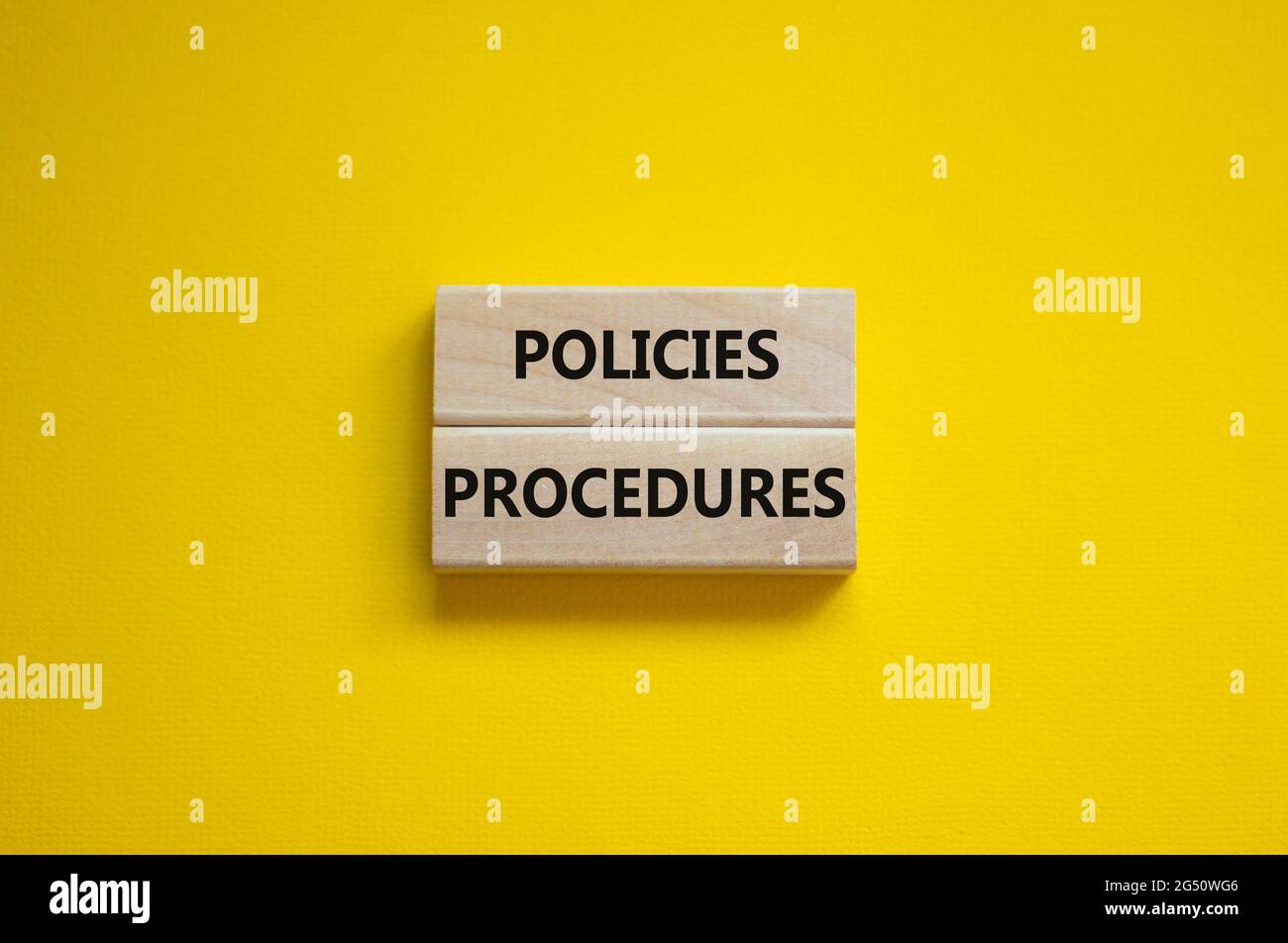 Policies and procedures symbol. Wooden blocks with concept words ...