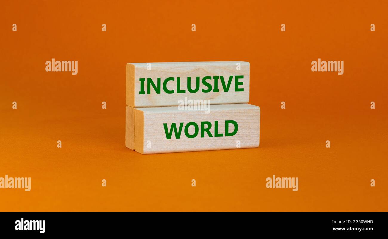 Inclusive world symbol. Wooden blocks with words Inclusive world on ...