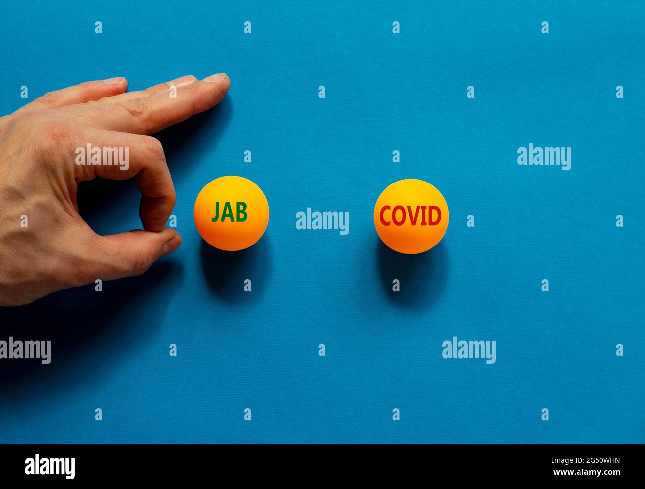 Covid-19 delta variant strain symbol. Male hand is about to flick the ...