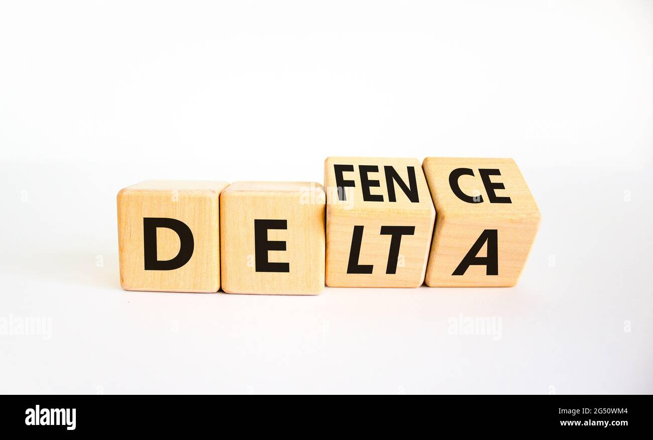 Covid-19 delta variant strain defence symbol. Turned the wooden cube ...