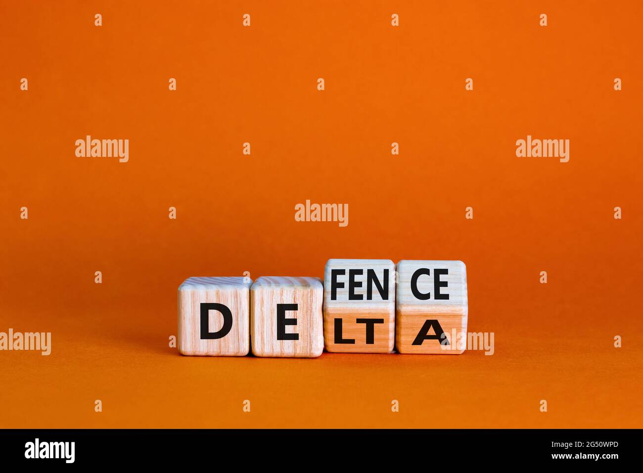 Covid-19 delta variant strain defence symbol. Turned the wooden cube ...