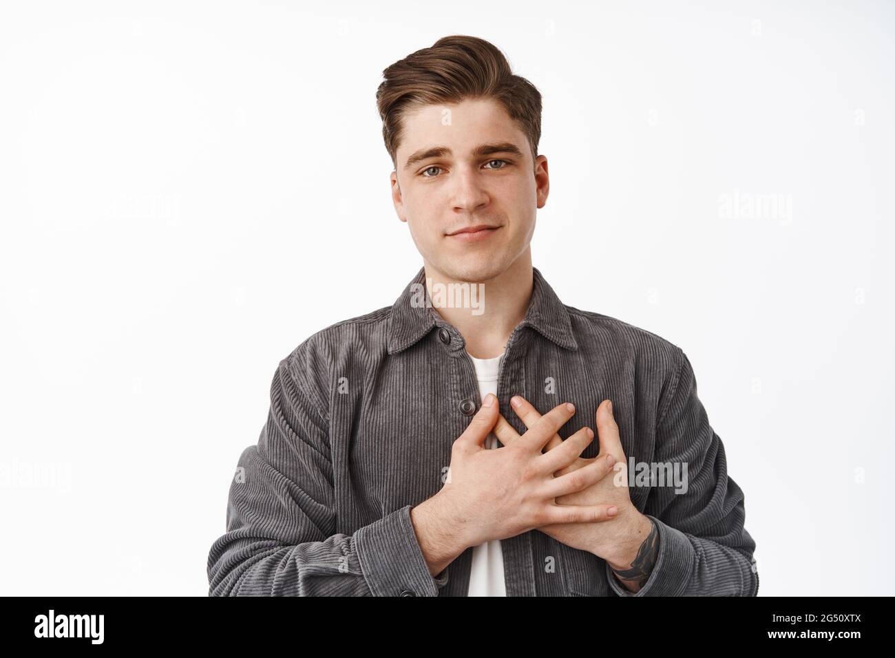 Smiling attractive boyfriend look with affection and grateful face ...