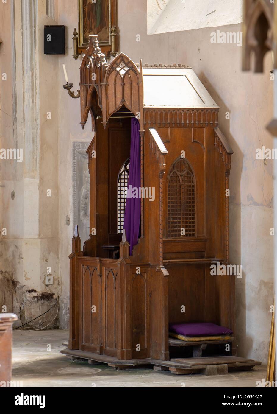 The historical confessional at neo-gothic church Stock Photo - Alamy