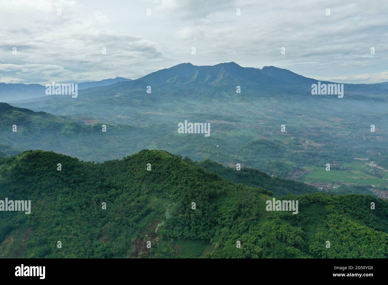 Tropical mountain and green forest at Indonesia Stock Photo - Alamy