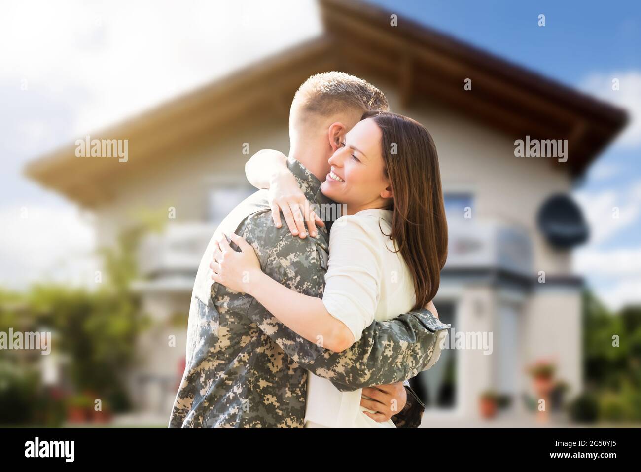 Military Army Soldier Hug. Happy Veteran Officer Day Stock Photo - Alamy