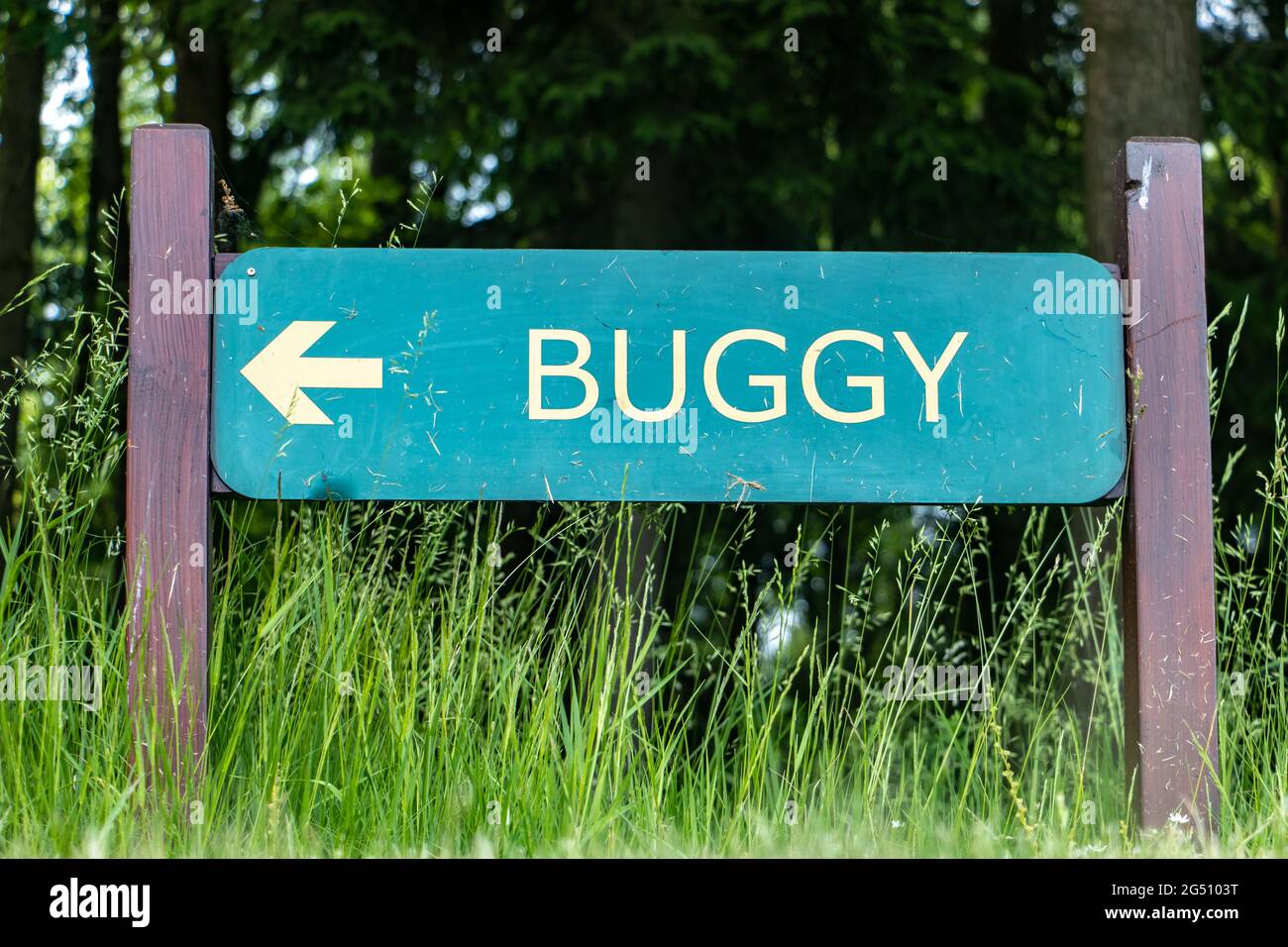 A board with direction of way on a golf course Stock Photo - Alamy