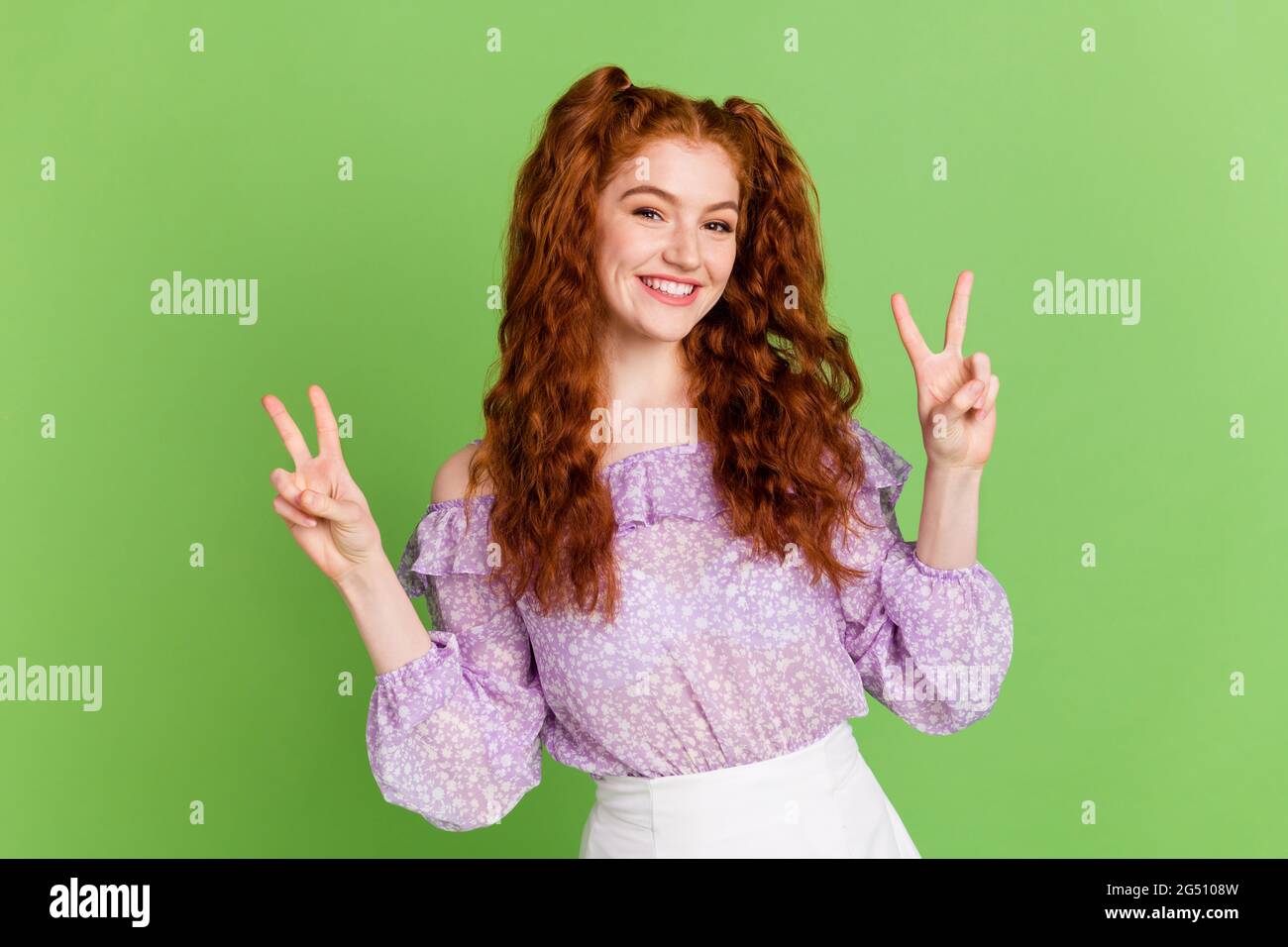 Photo of cool red hairstyle young lady show v-sign wear violet blouse ...