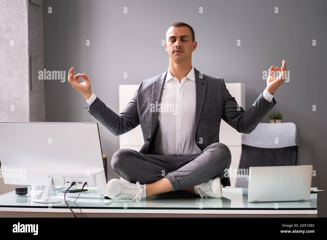 Yoga Meditation Exercise In Office. Male Business Man Meditating Stock ...