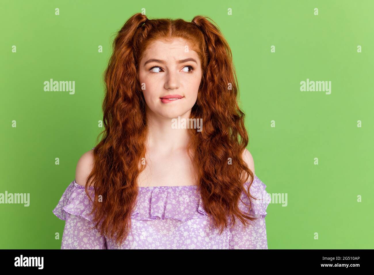 Photo Of Sad Ginger Hairstyle Millennial Lady Look Empty Space Bite Lip